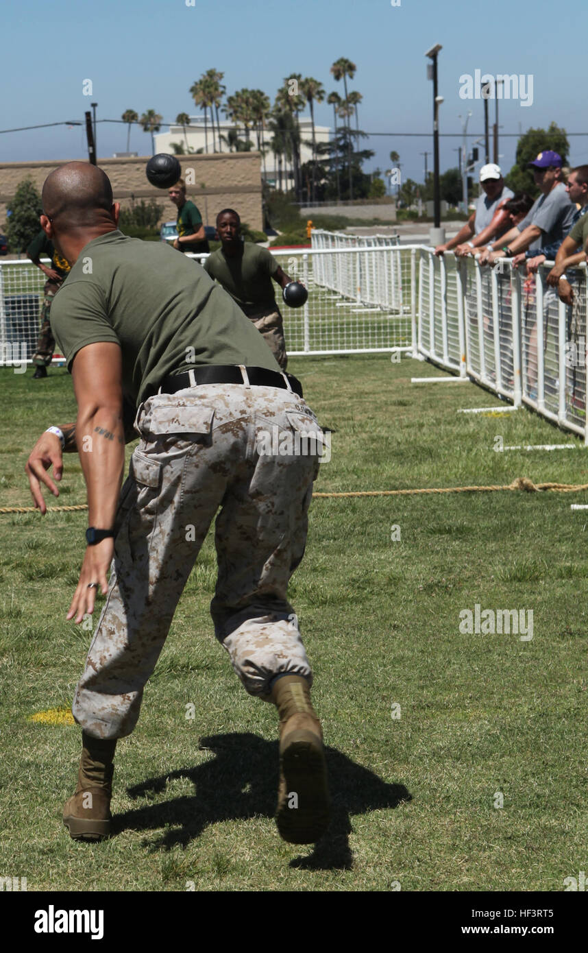 A Marine volunteer with the Single Marine Program plays dodge ball ...