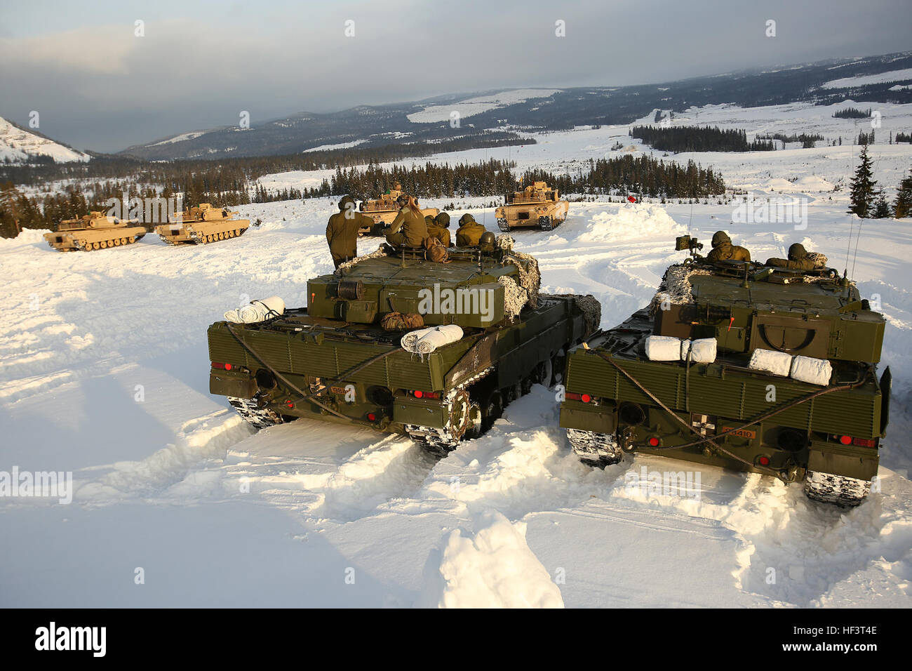 M1A1 Abrams Tanks fire their main guns as Norwegian Leopard 2 tank ...