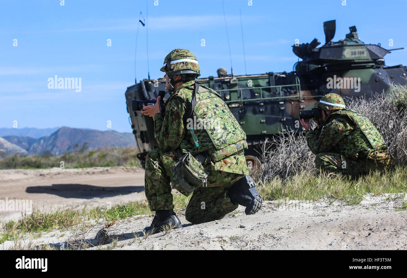 Japan Ground Self-Defense Force cameramen take photos of incoming ...