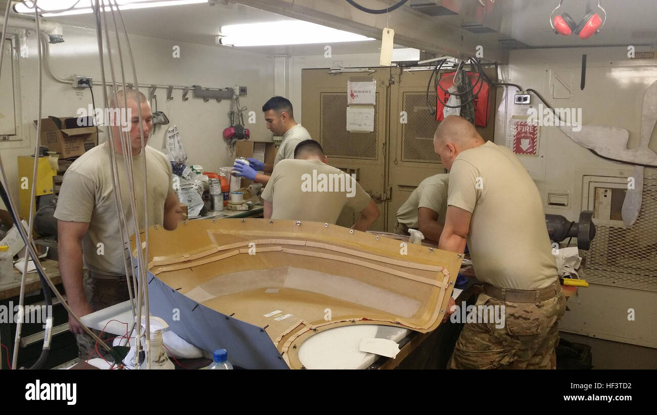 Army National Guard sheet metal repairers in Company B, 640th Aviation ...