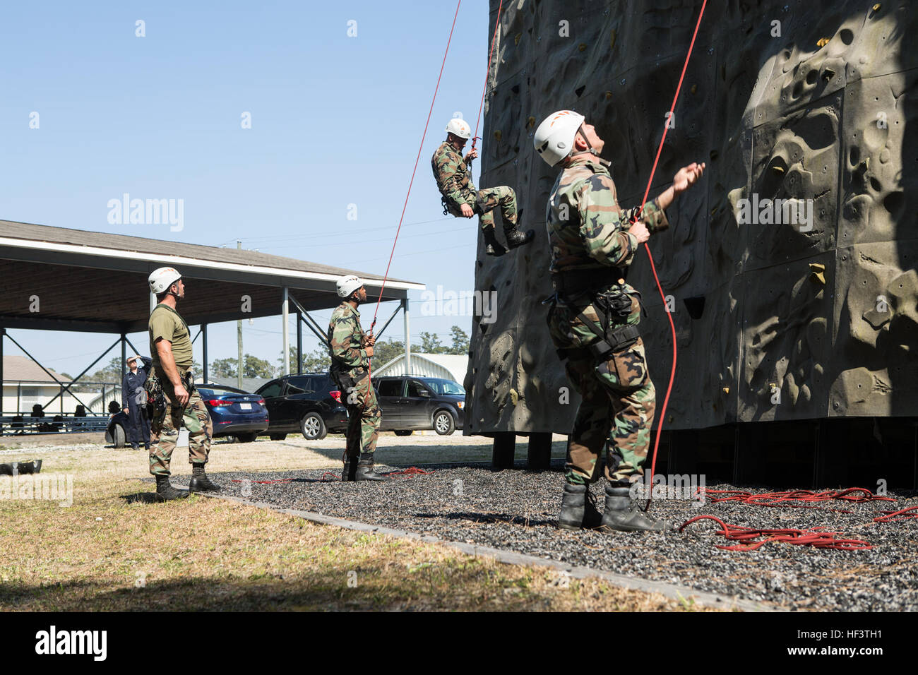Royal Netherlands Marines rappel during a fast roping exercise at the ...