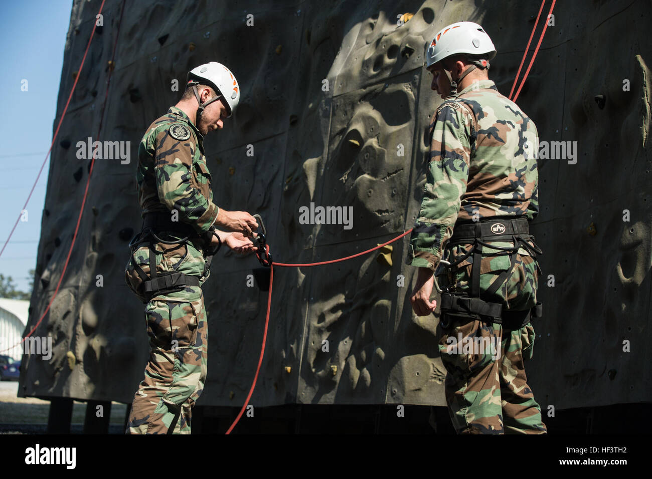 A Royal Netherlands Marine secures their harnesess prior to conducting ...