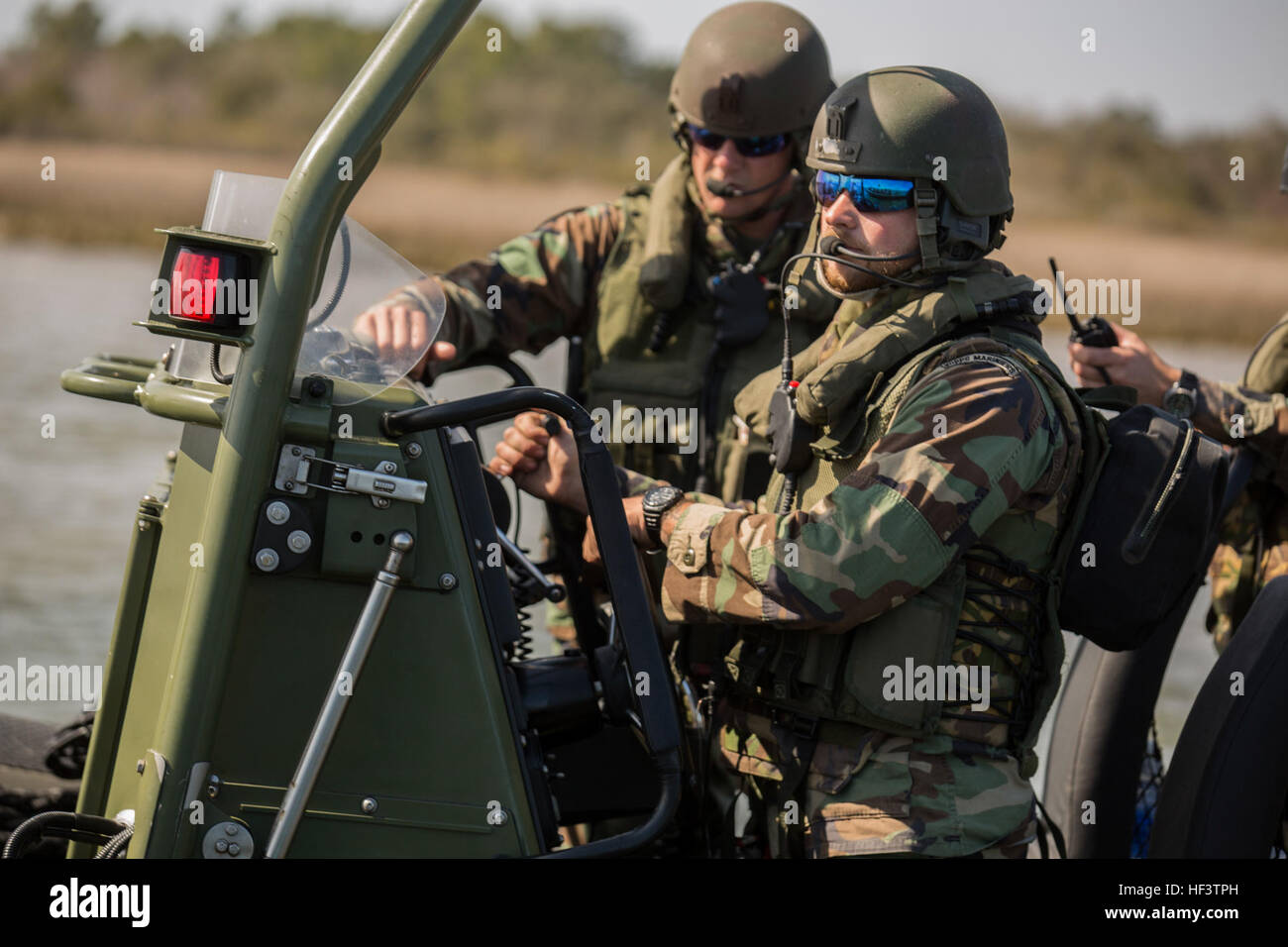 A Dutch Marine with the Fast Raiding Intercepting Special Forces Craft ...