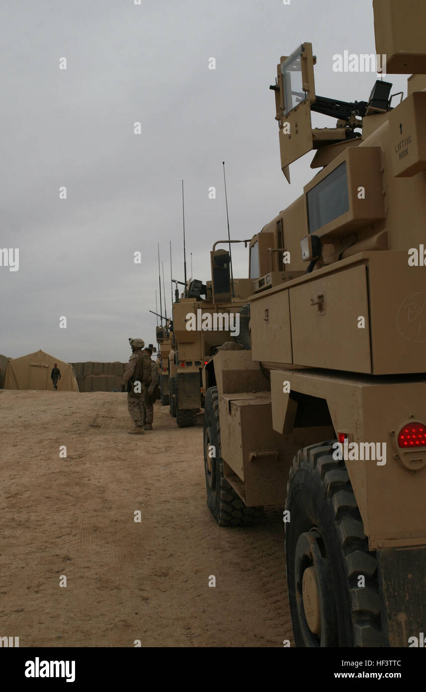 Marines mounted in mine-resistant ambush-protected vehicles point their ...