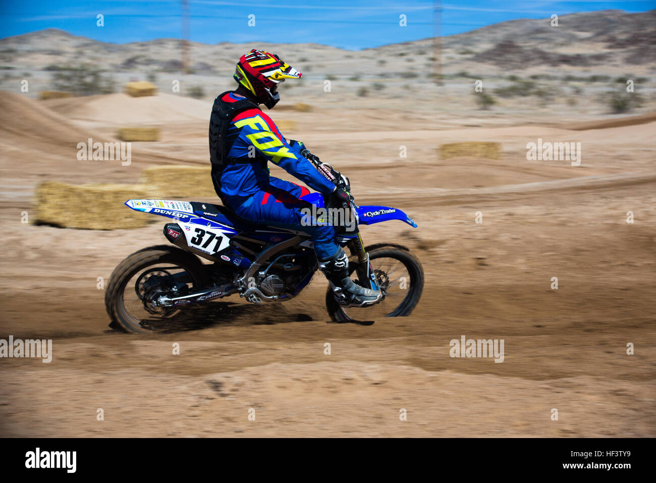 Motocross riders race and perform stunts during the Marine Corps ...