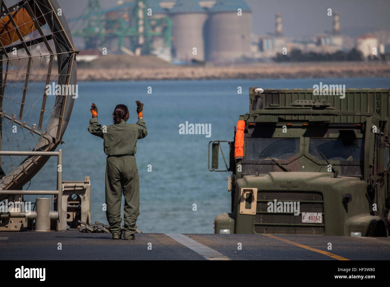 U.S. Navy sailor BM3 Kiana MartinDelCampo, Naval Beach Unit 7(NBU 7 ...