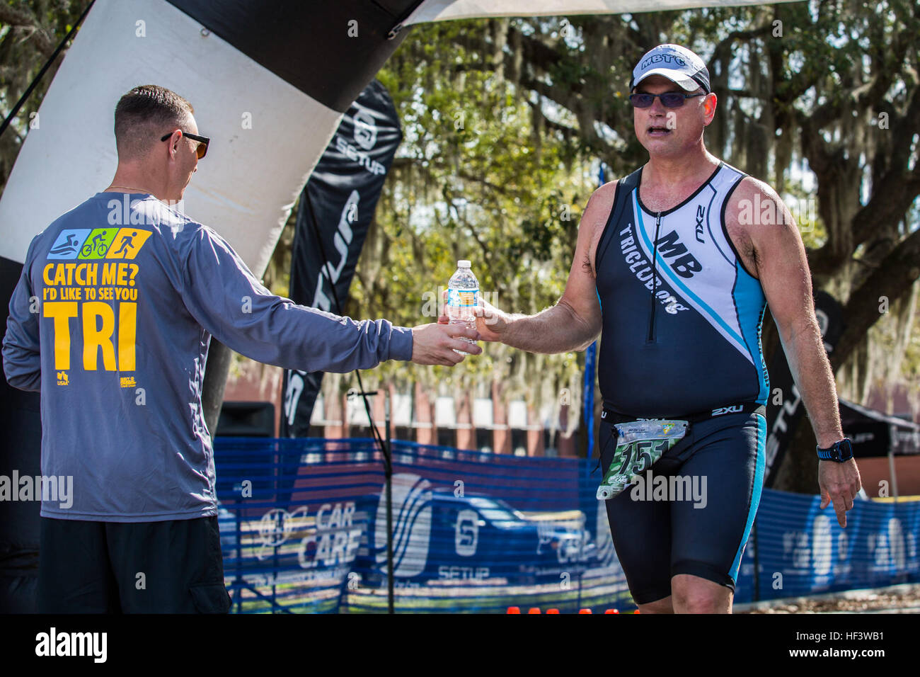 A runner completes a 5 km. run during the Parris Island Triathlon ...