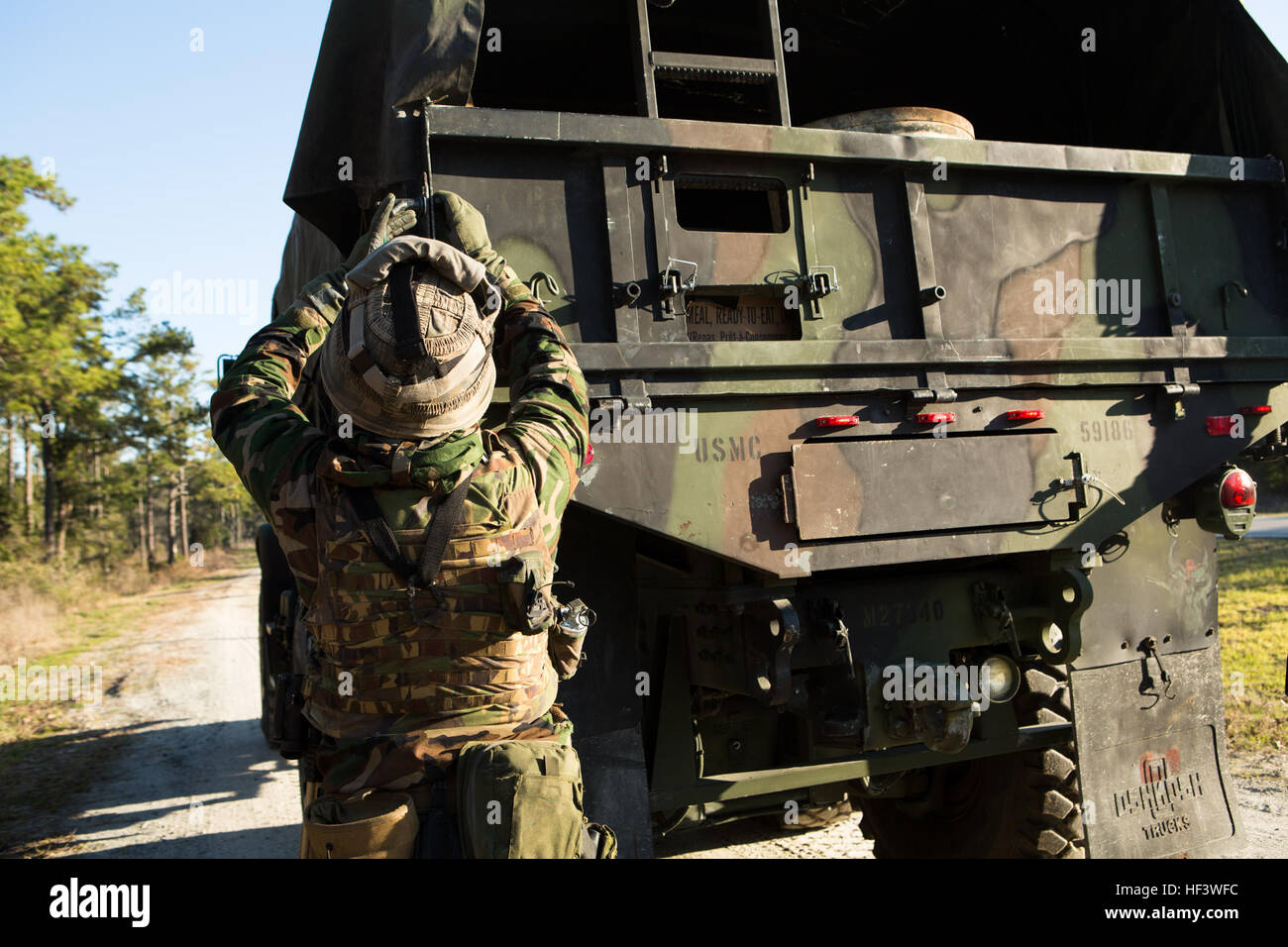 A Royal Netherlands Marine searches a 7-Ton Truck Medium Tactical ...
