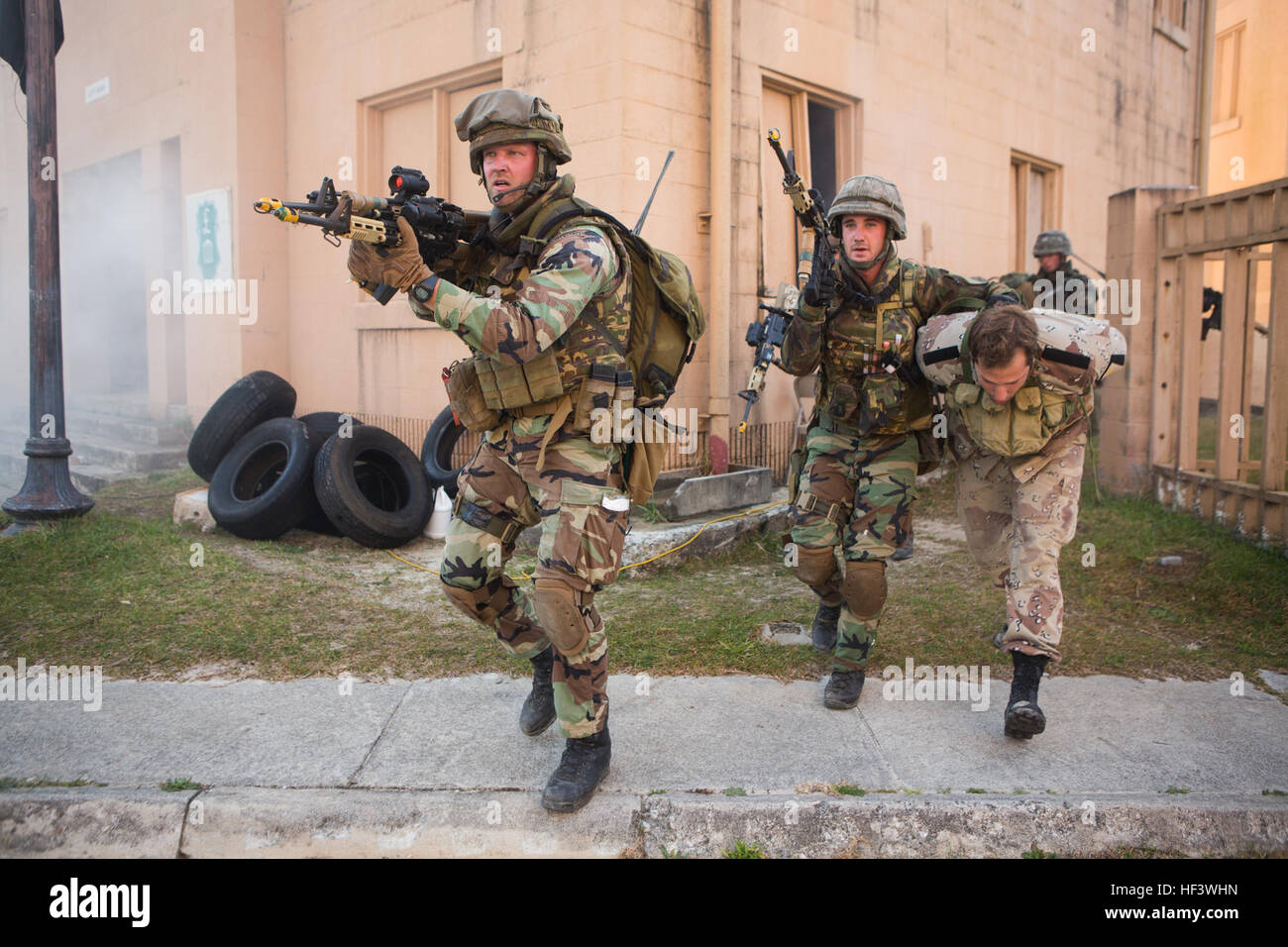 Royal Netherlands Marines move a role-playing captured insurgent during ...