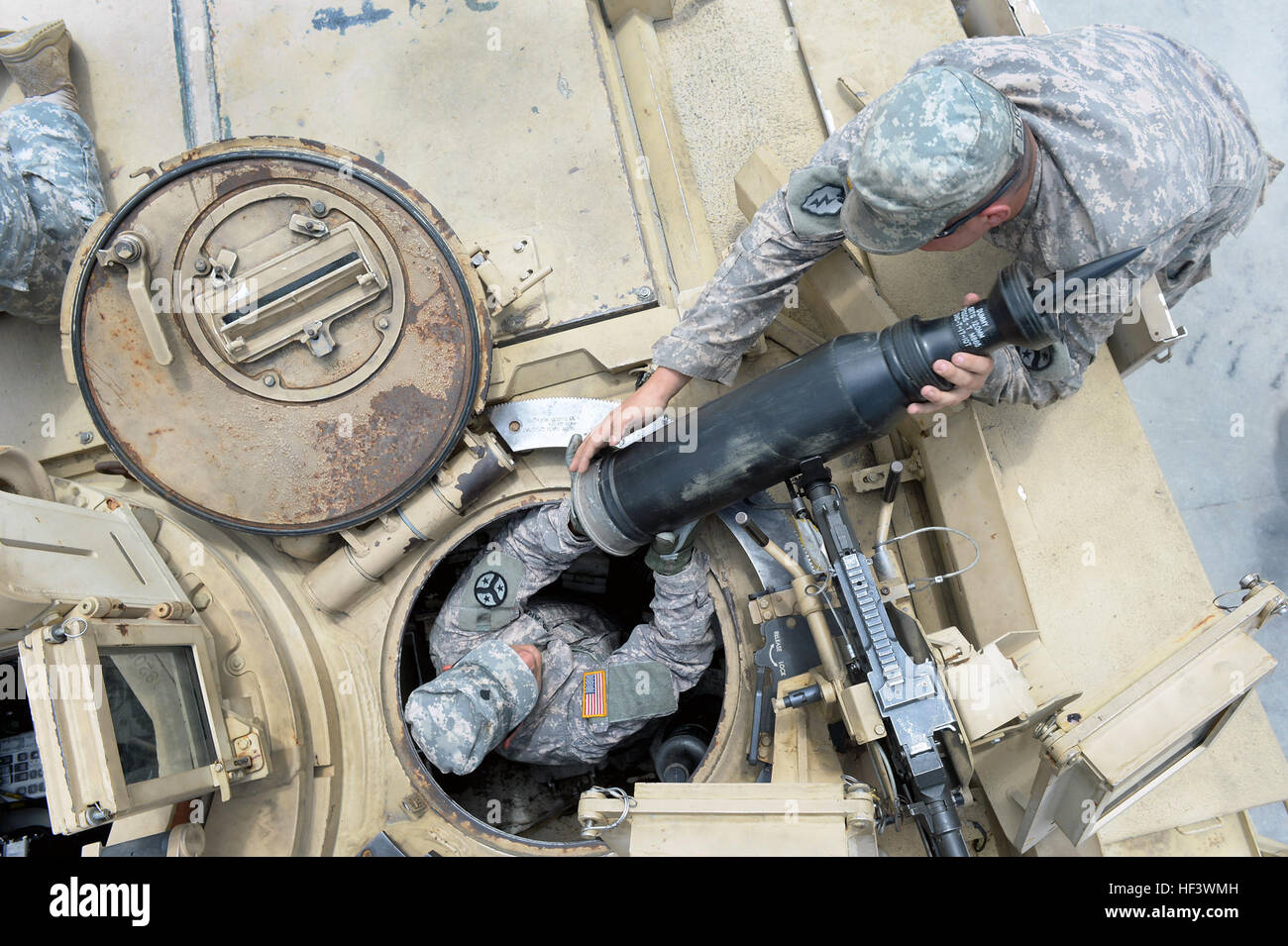 Army Sgt. Ryan Duginski, right, with the Tennessee Army National Guard ...