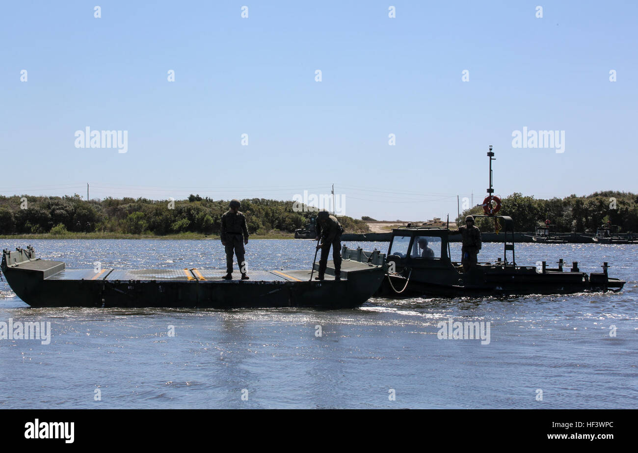 Marines with Bridge Company, 8th Engineer Support Battalion utilize a ...