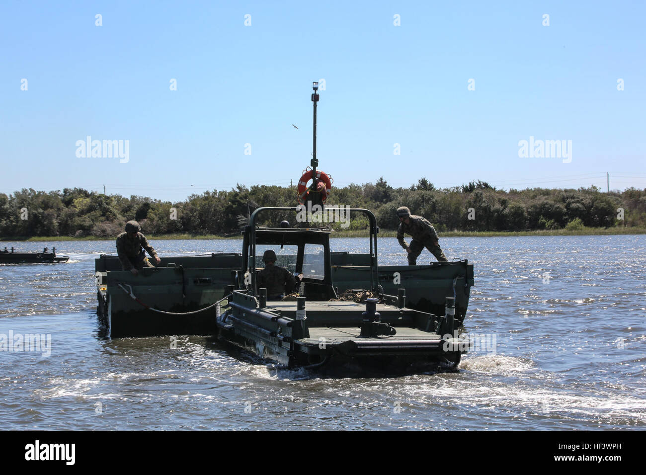 Marines with Bridge Company, 8th Engineer Support Battalion utilize a ...