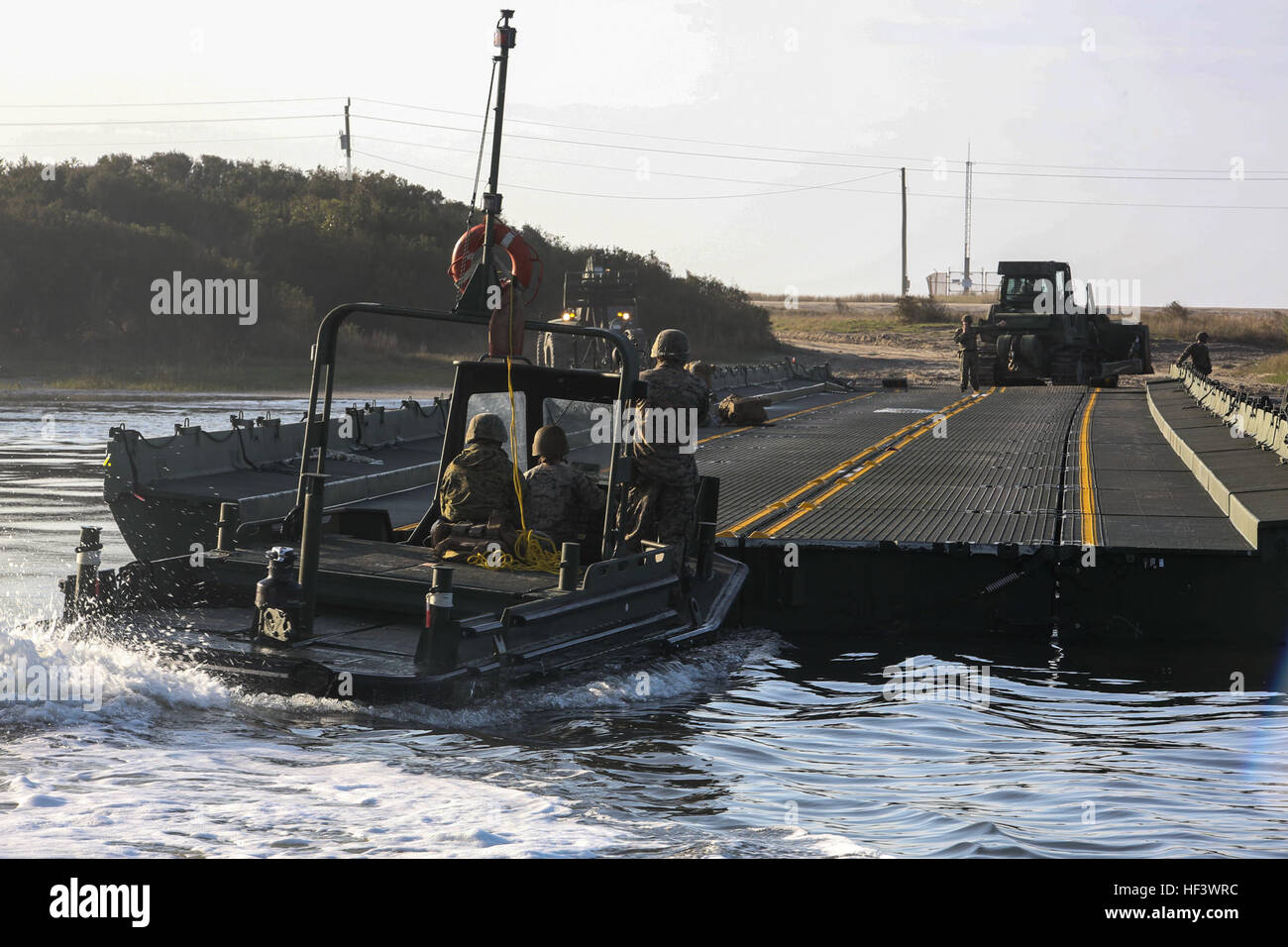 Marines with Bridge Company, 8th Engineer Support Battalion utilize a ...