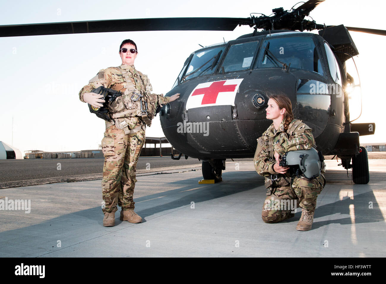 Capt. Nicki Burtcher, an en route critical care nurse, and Sgt. Janet ...