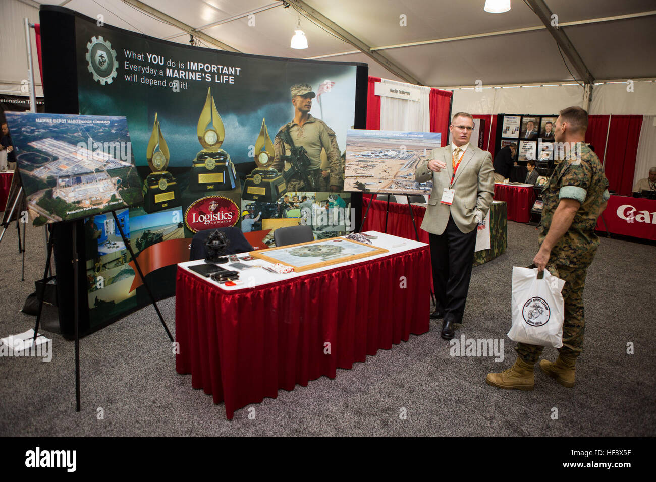 Eric Gilmer, left, exhibitor with Marine Depot Maintenance Command ...