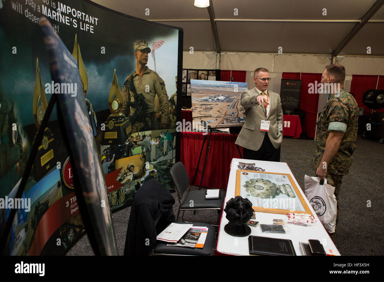 Eric Gilmer, left, exhibitor with Marine Depot Maintenance Command ...