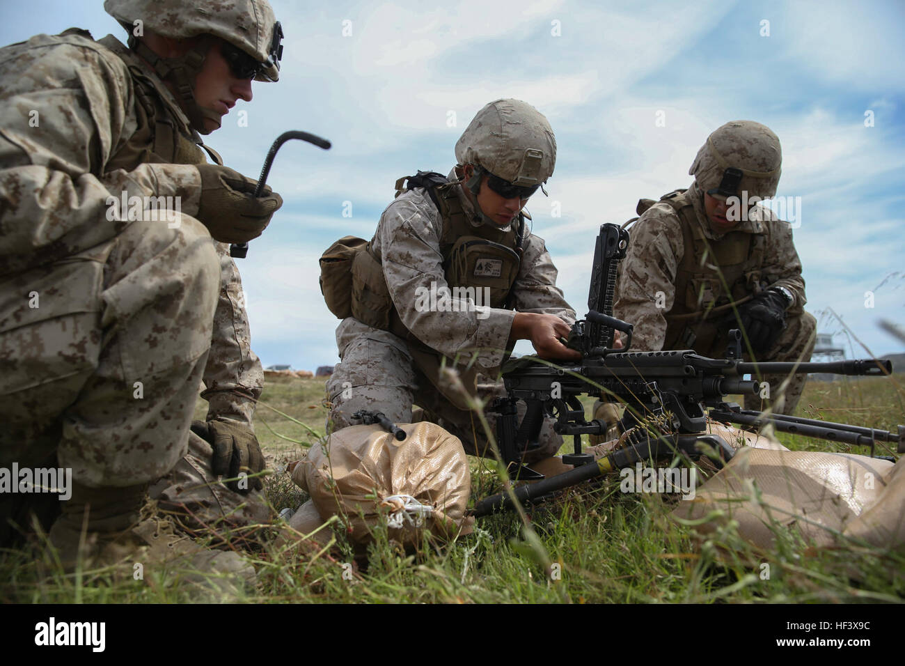 Corporal Jalen Freiberg [center], a machine gunner with Company K, 3rd ...