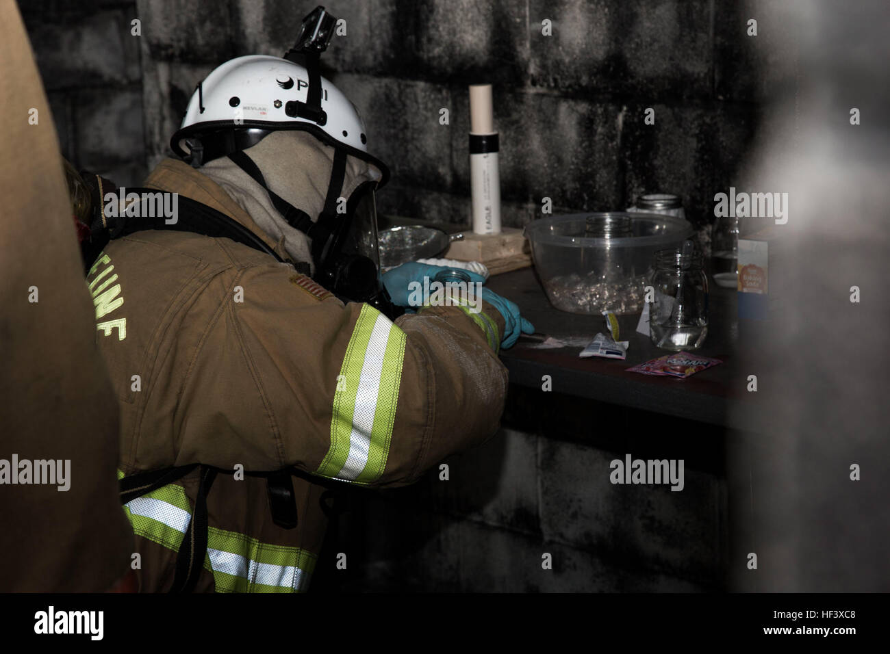 A Camp Lejeune Fire and Emergency Service Division fire fighter ...
