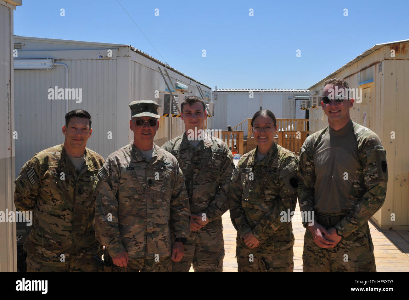 Command Sgt. Maj. Troy Eck, second from left, command sergeant major of ...
