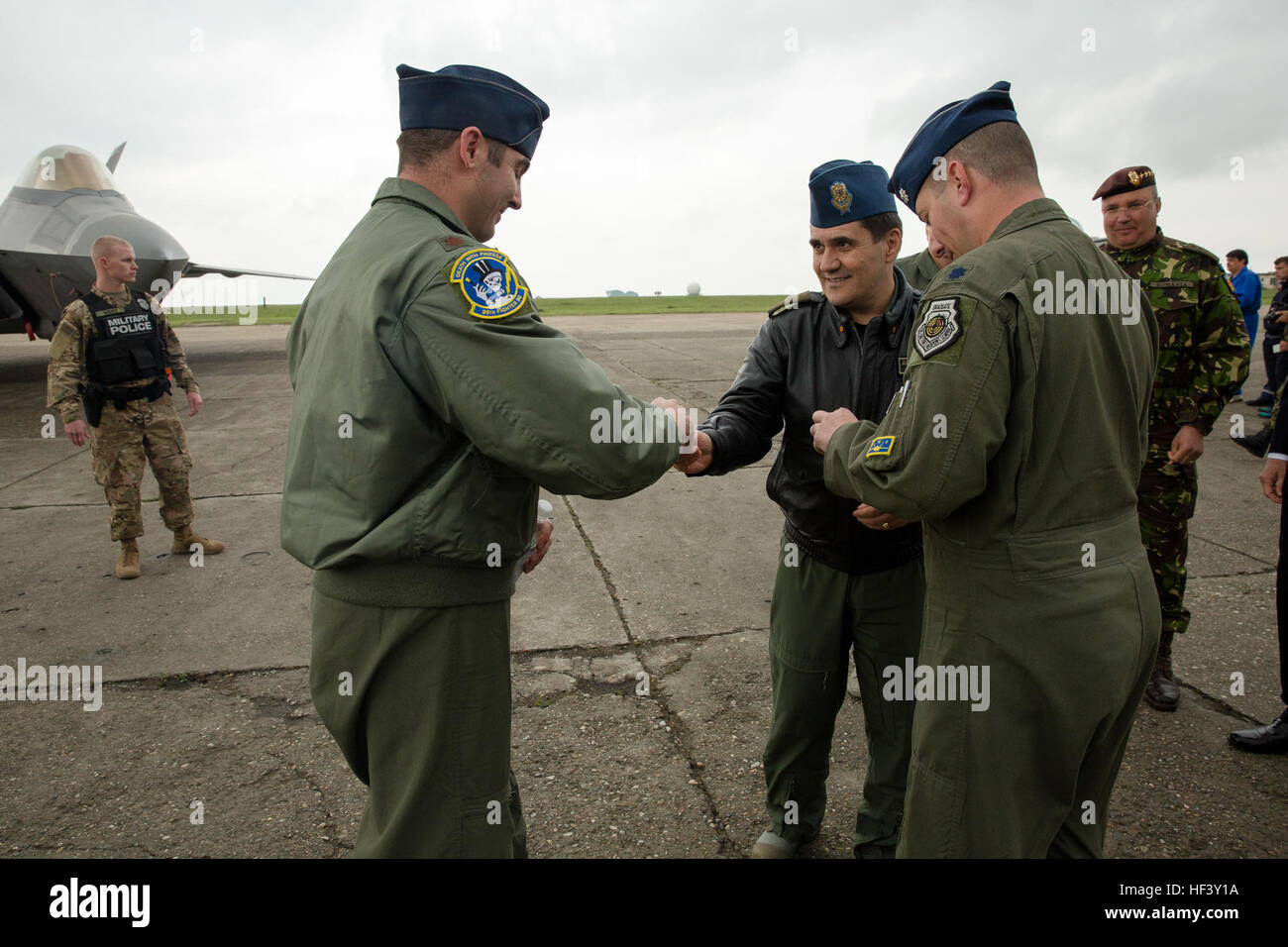 Romanian Air Force Maj. Gen. Laurian Anastasof, center, Chief of the ...