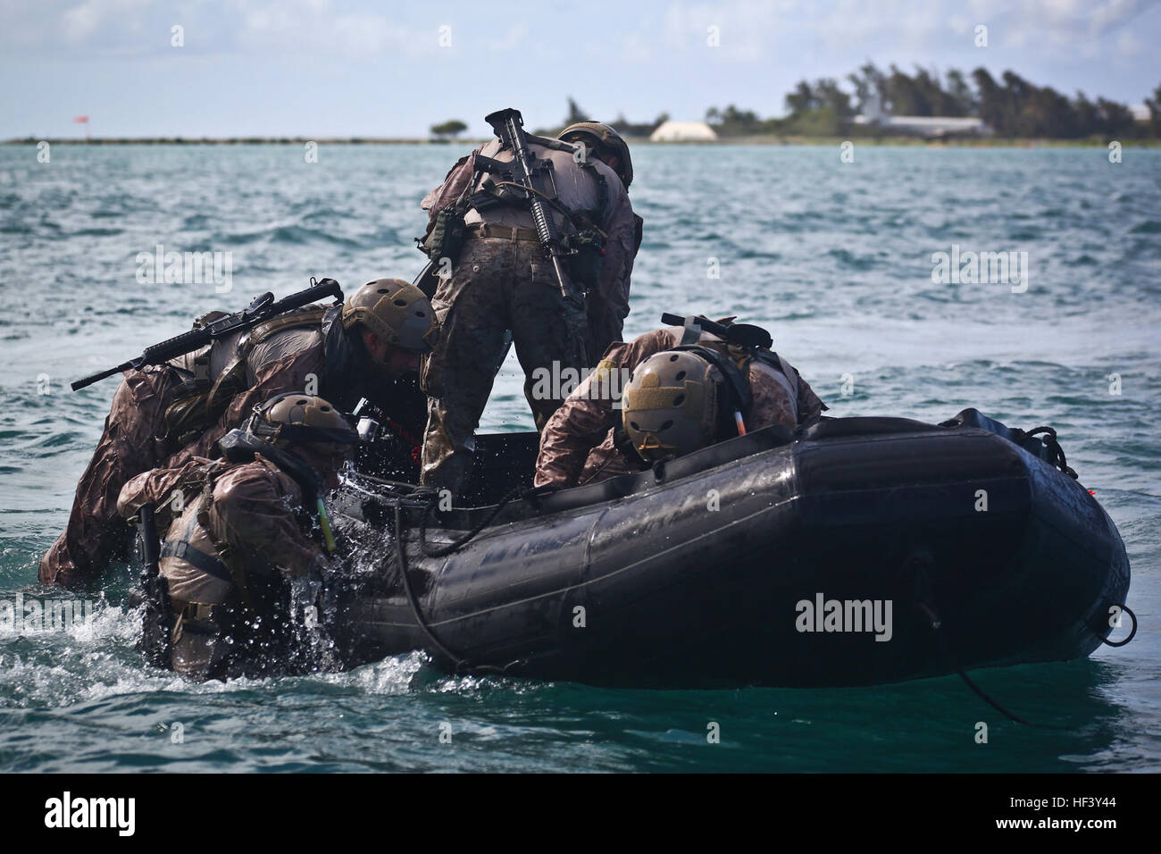 U.S. Reconnaissance Marines board a combat rubber raiding craft during ...