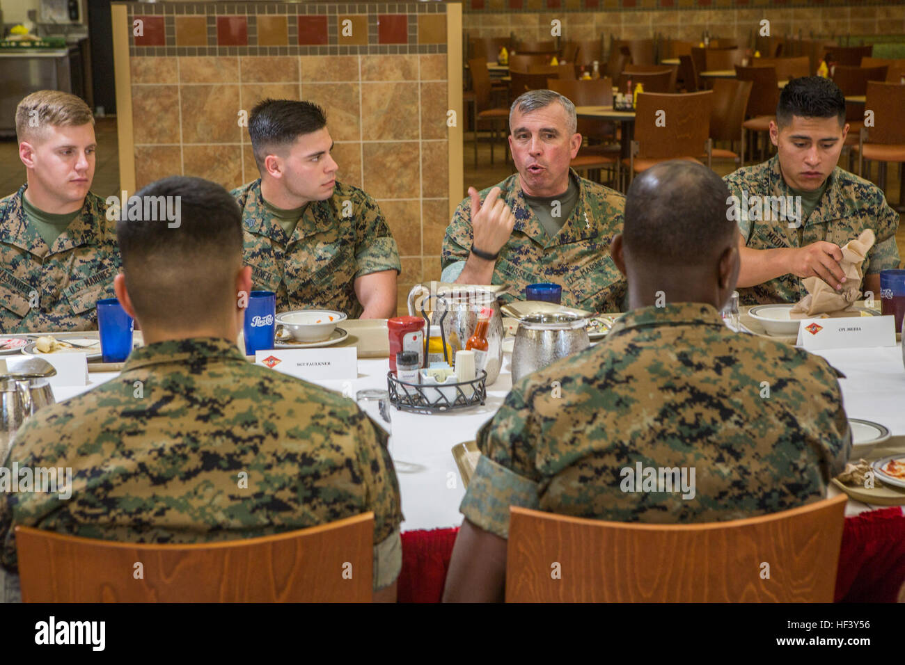 U.S. Marine Corps Lt. Gen. John E. Wissler, center, the commander of U ...