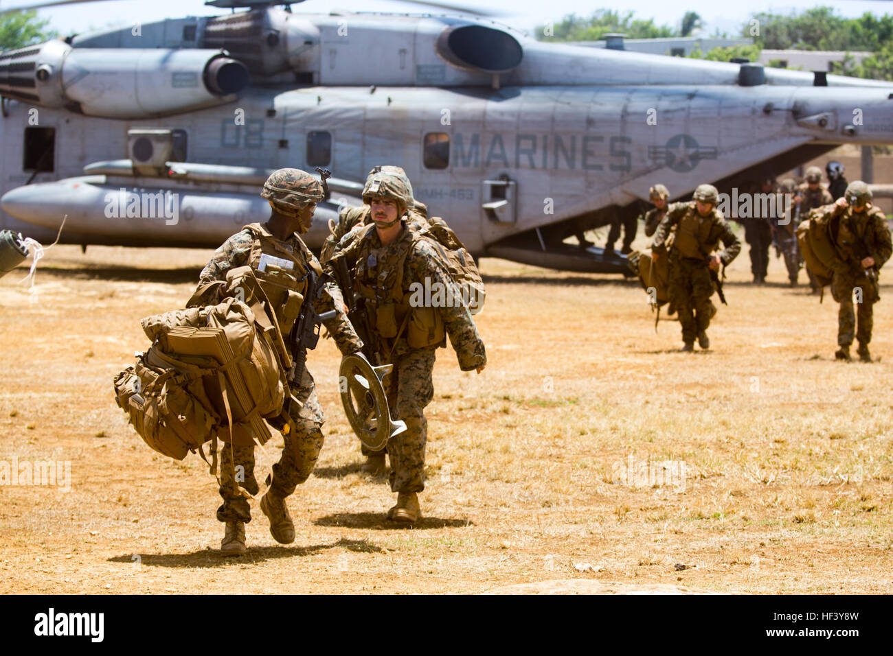 U.S. Marines assigned to 3rd Battalion, 3rd Marine Regiment disembark ...