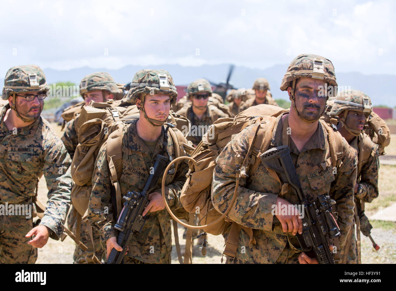 U.S. Marines assigned to 3rd Battalion, 3rd Marine Regiment exit off ...