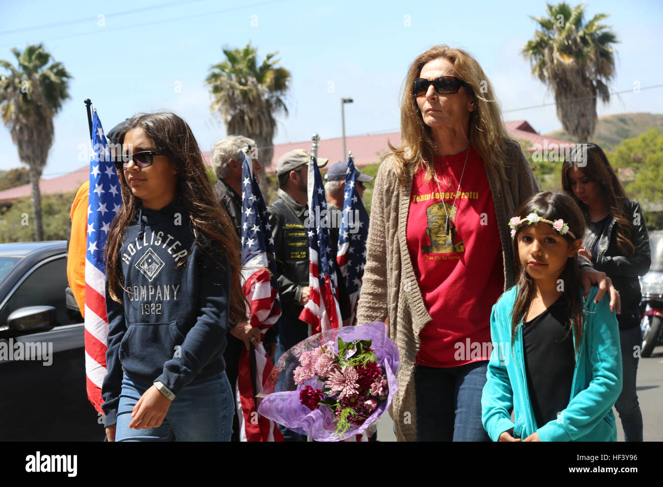 MARINE CORPS BASE CAMP PENDLETON, Calif. – Family and friends walk past ...