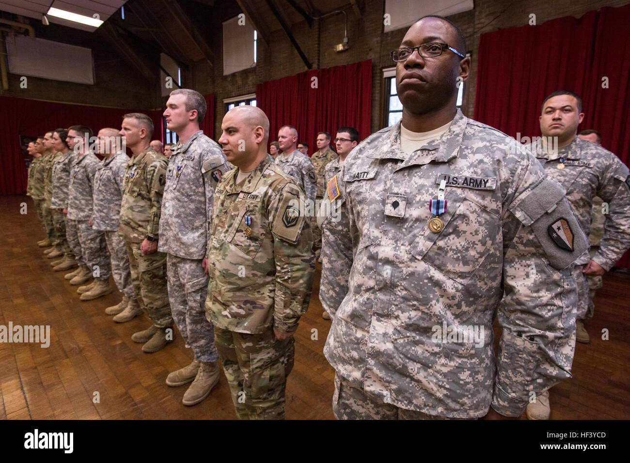 New Jersey Army National Guard Soldiers stand at attention after ...
