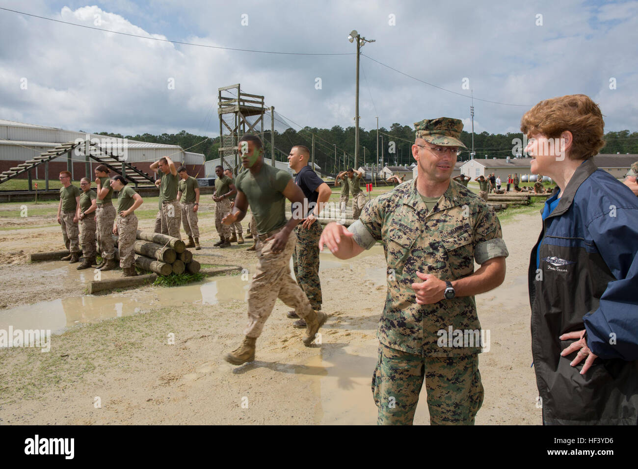 U.S. Marine Corps Col. Steven Wolf, left, commanding officer, School of ...