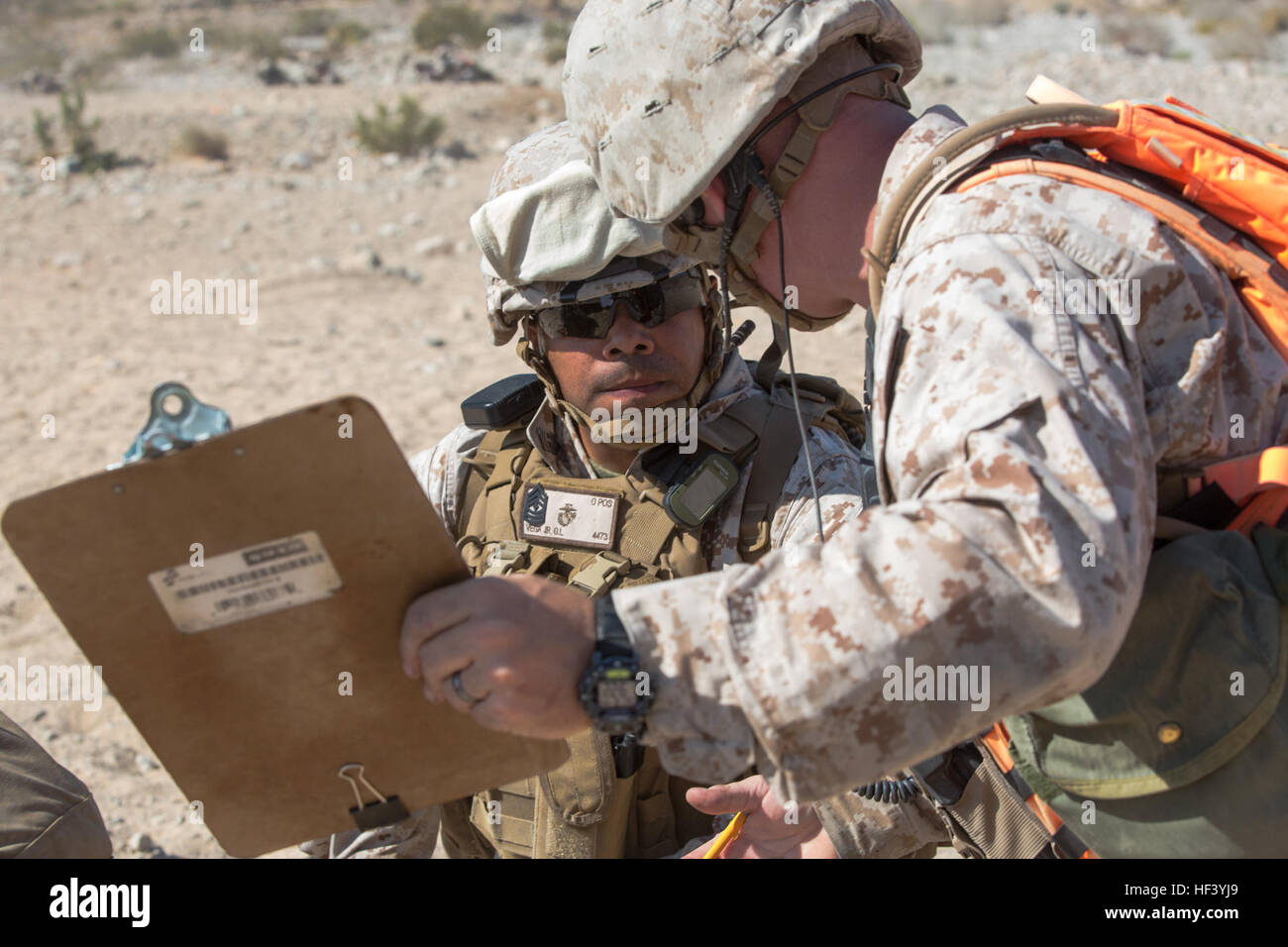 A Coyote vehicle with Tactical Training Exercise Control Group briefs a ...