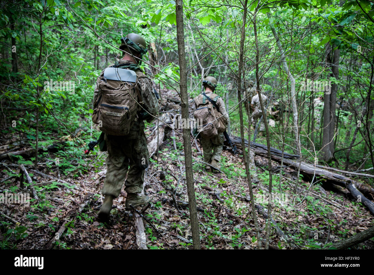 U.S. Marines attending the Military Police Basic Course, conduct foot ...