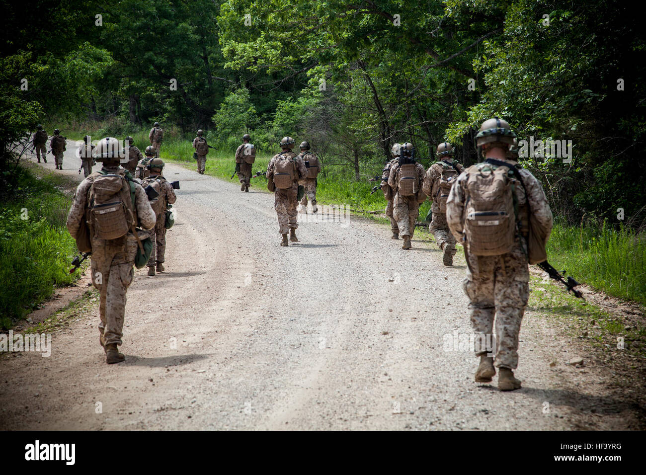 U.S. Marines attending the Military Police Basic Course, conduct foot ...