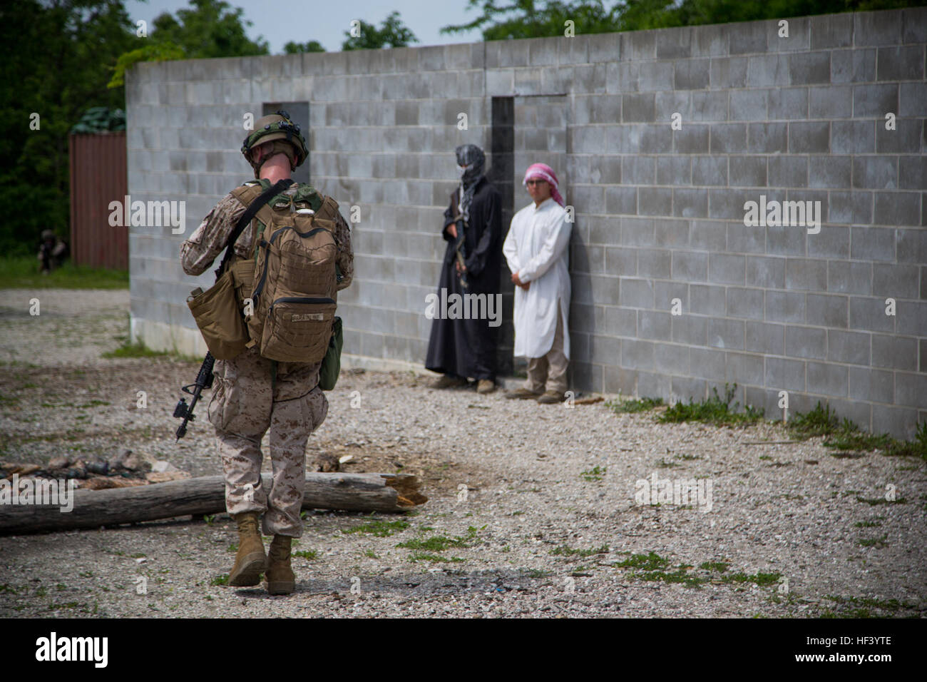 A U.S. Marine attending the Military Police Basic Course, performs ...