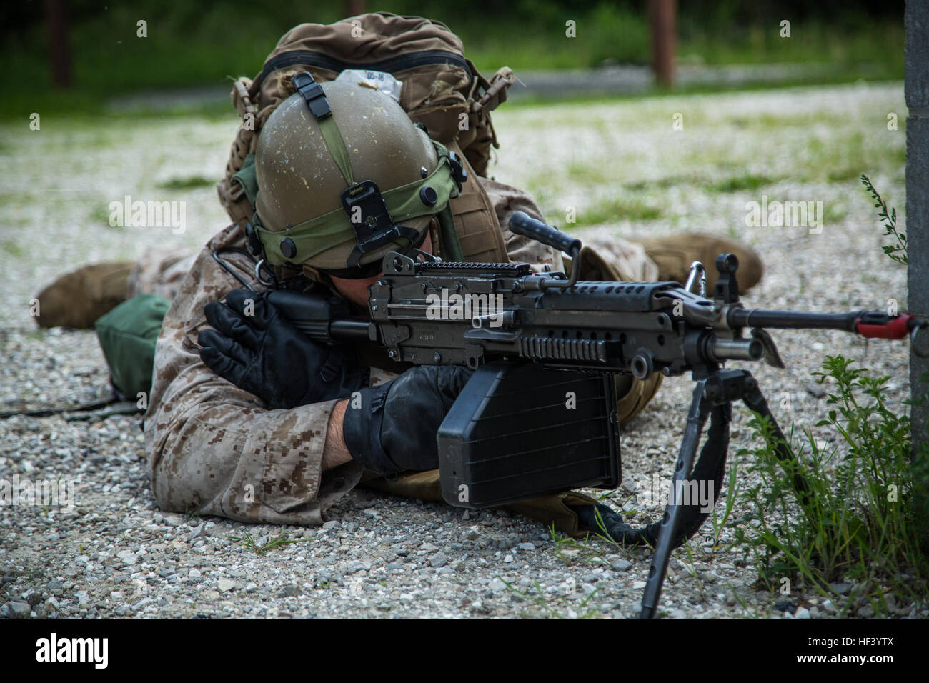 A U.S. Marine attending the Military Police Basic Course, provides ...