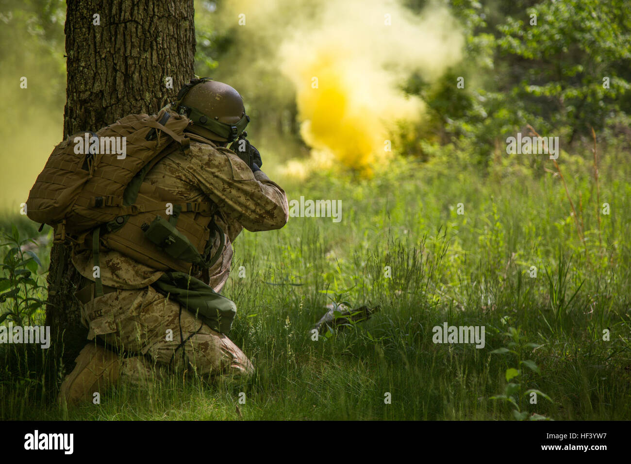 A U.S. Marine attending the Military Police Basic Course, provides ...
