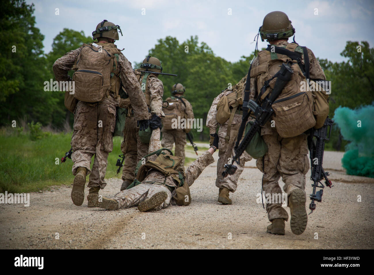 U.S. Marines attending the Military Police Basic Course, move a ...