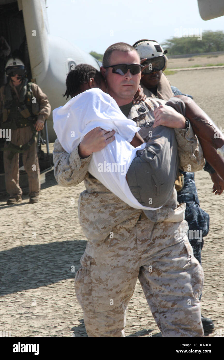 Petty Officer 1st Class James Carbone, a hospital corpsman with Command ...