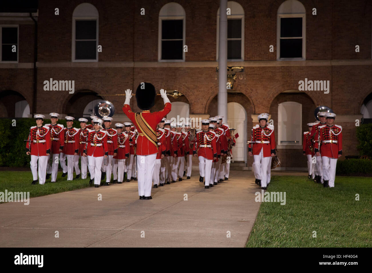 Members of the U.S. Marine Band perform during an evening parade at ...