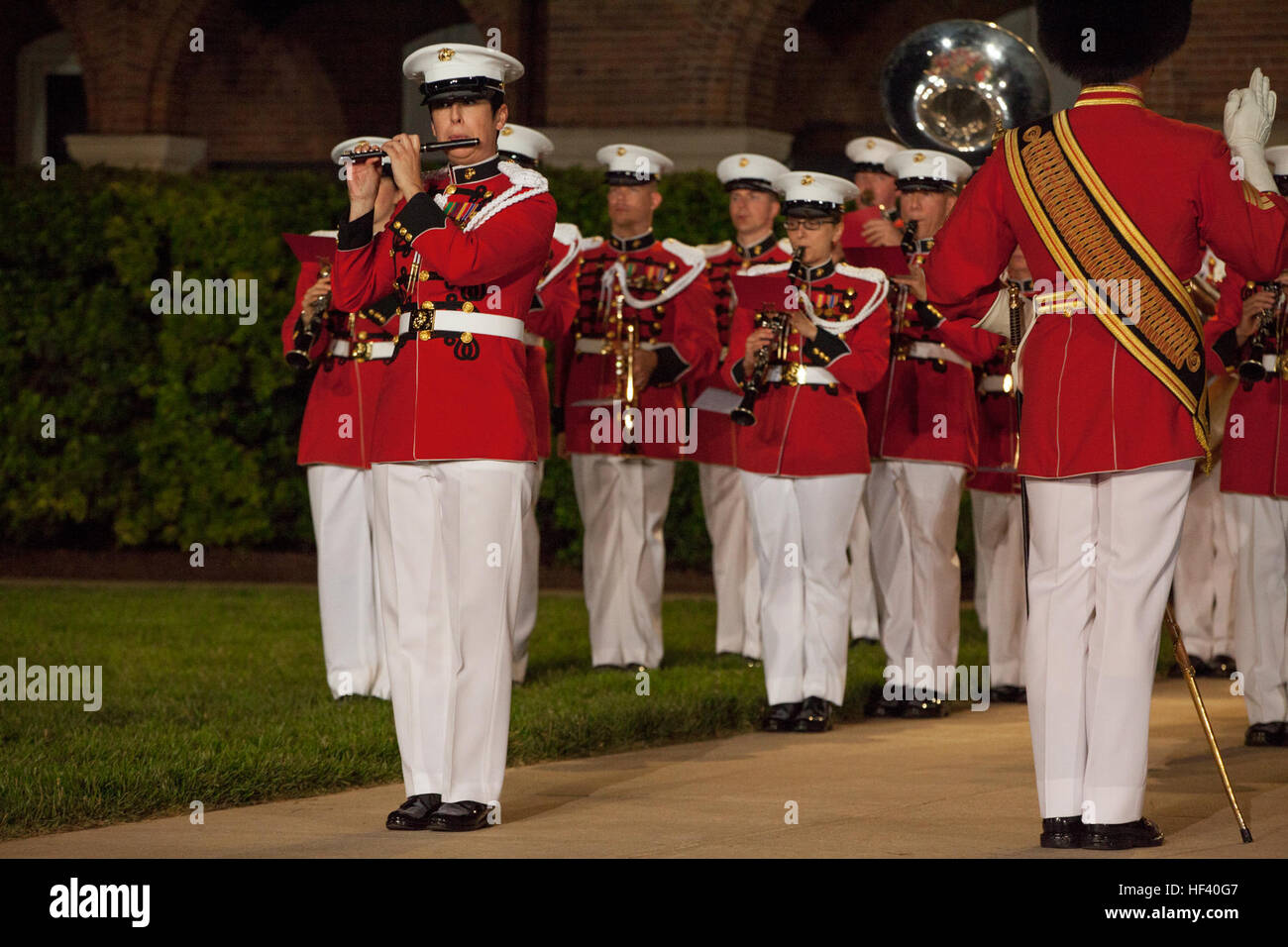 Members of the U.S. Marine Band perform during an evening parade at ...