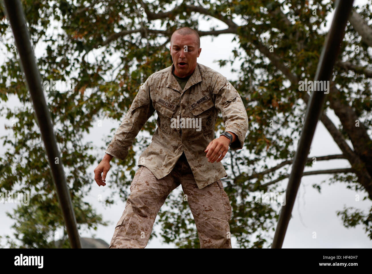 A reconnaissance Marine runs the obstacle course in reverse, starting ...