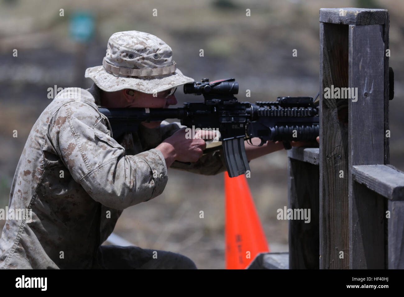A reconnaissance Marine fires an M4 rifle during the annual Recon ...