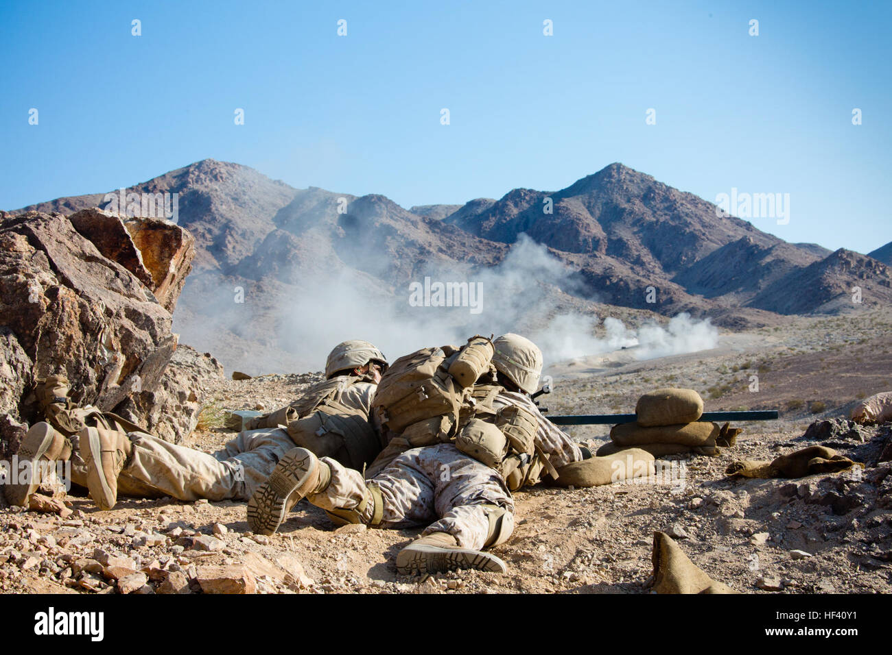 U.S. Marines with Kilo Company, 3rd Battalion, 2nd Marines, fire their ...