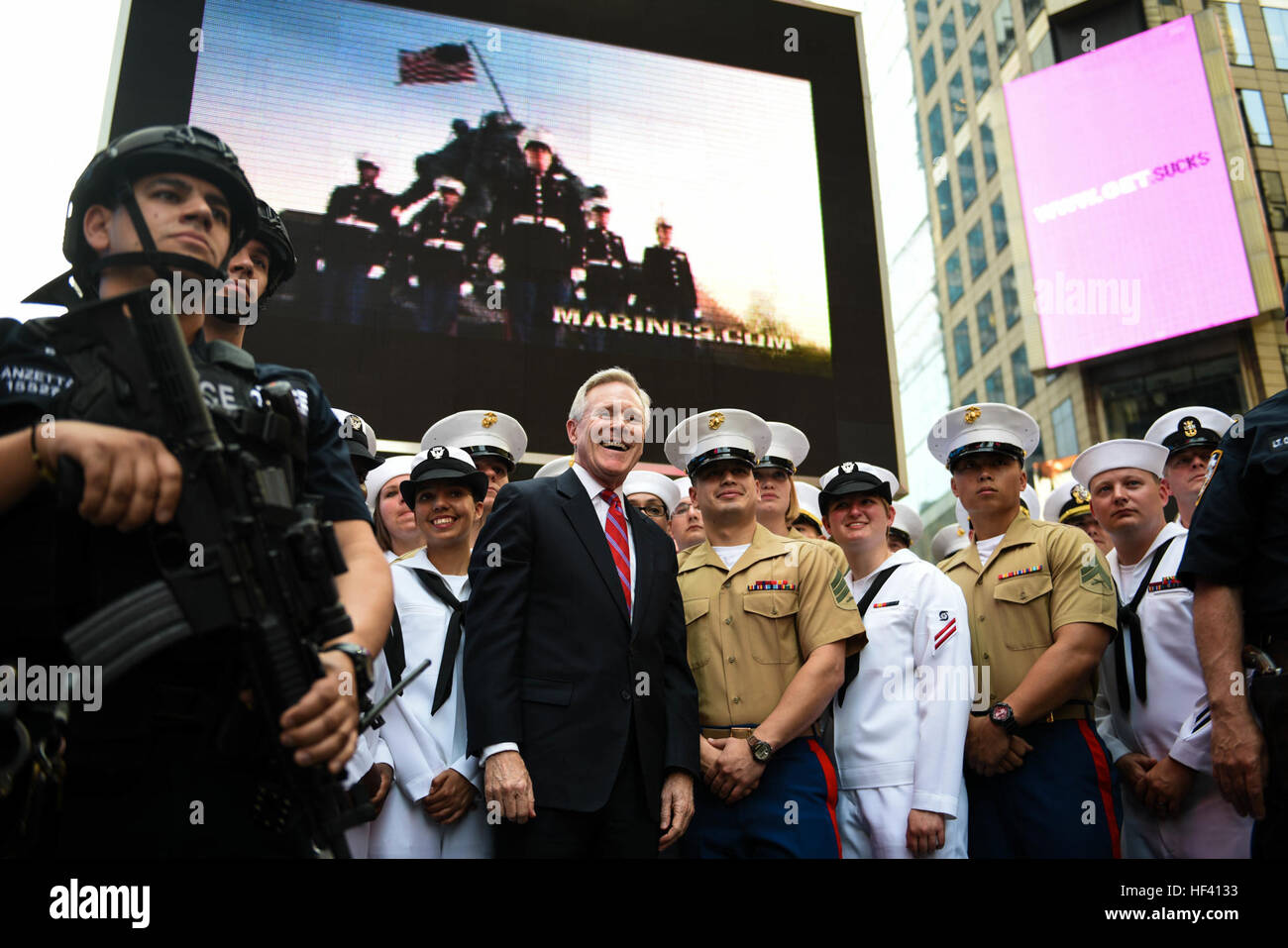The U.S. Secretary of the Navy Ray Mabus poses for a photo with a group ...