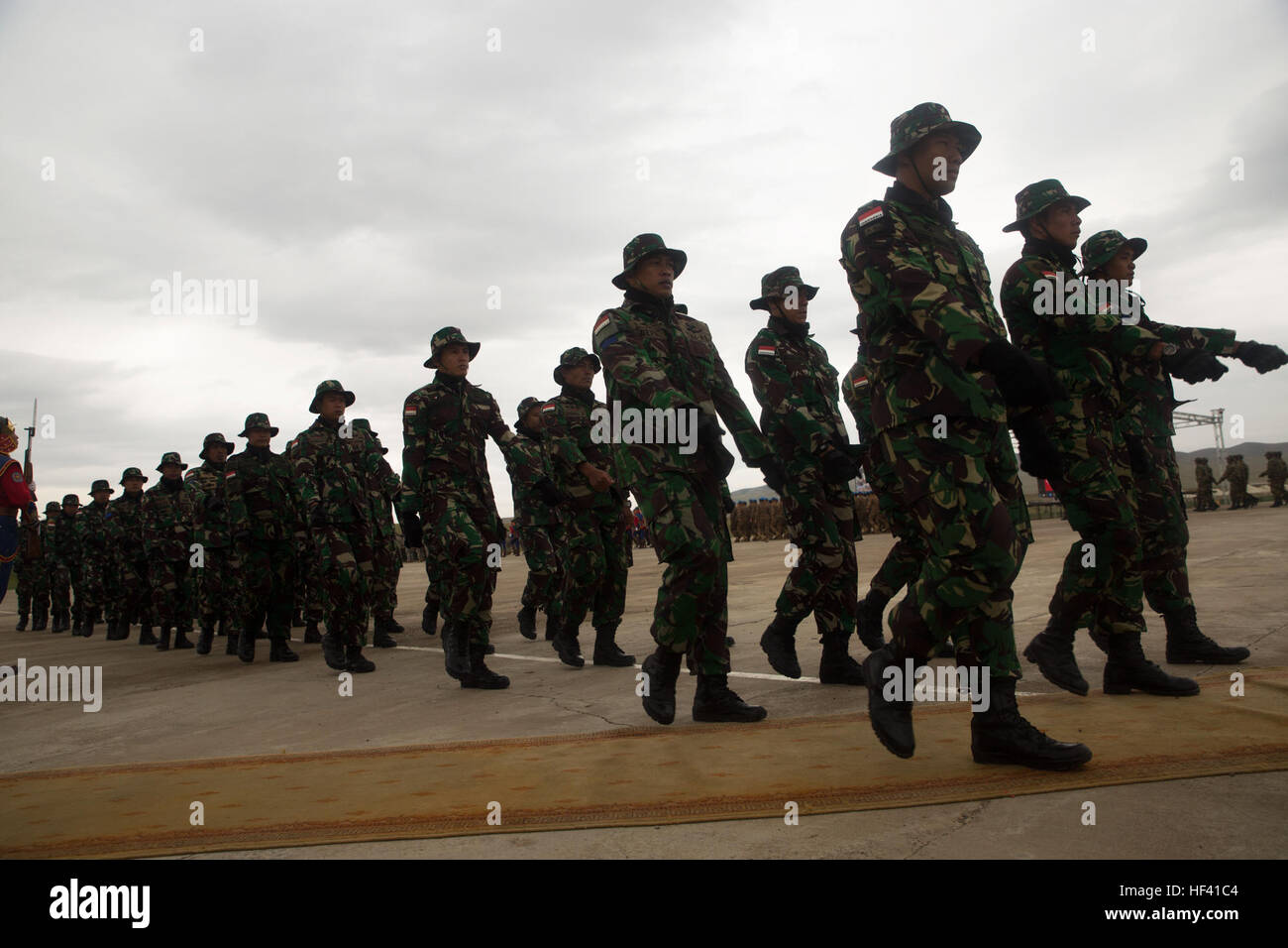 Indonesian Army service members march during the Khaan Quest 2016 ...