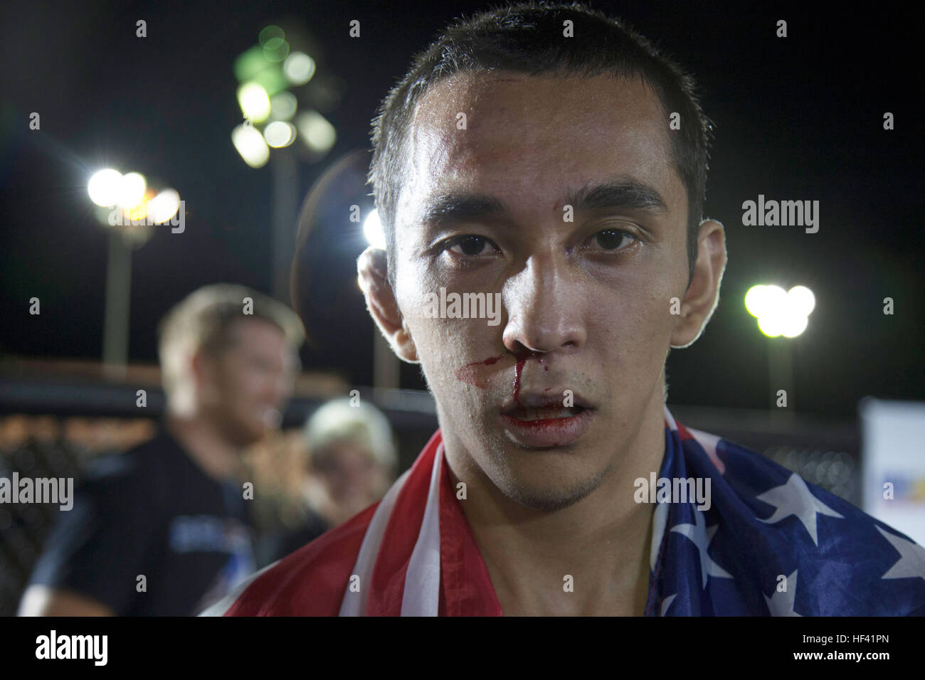 Matt Padilla, an amateur fighter from Temecula, Calif., steps out of the ring after his fight ...