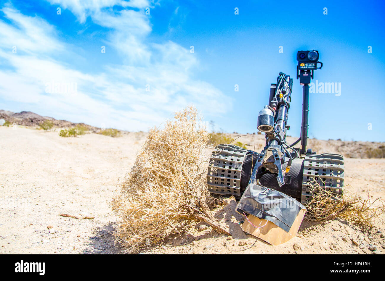 A Talon man-transportable robotic system, operated remotely by Marine ...
