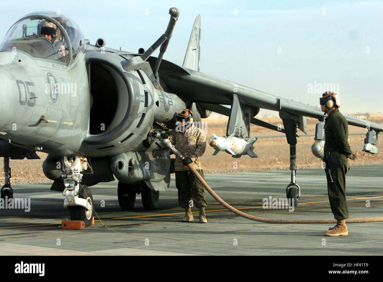 Sgt. Caleb Bailey, left, an AV-8B Harrier mechanic with Marine Attack ...