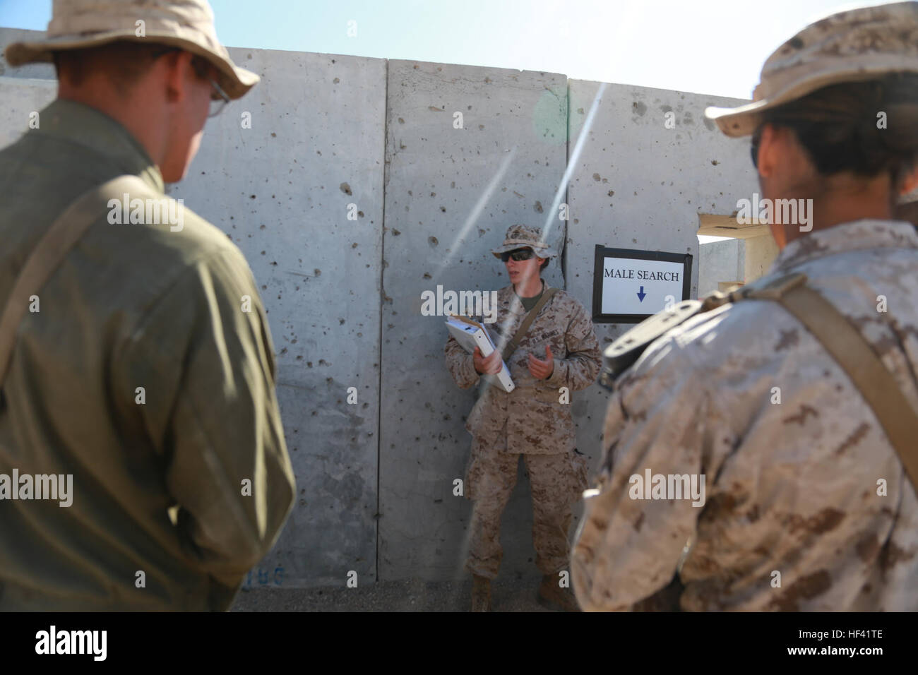 First Lt. Caitlin Larson speaks to Marines and sailors about an ...